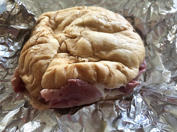 The pastrami sandwich doesn't need to show off—it just sits there confidently, knowing it's about to make someone's day infinitely better.