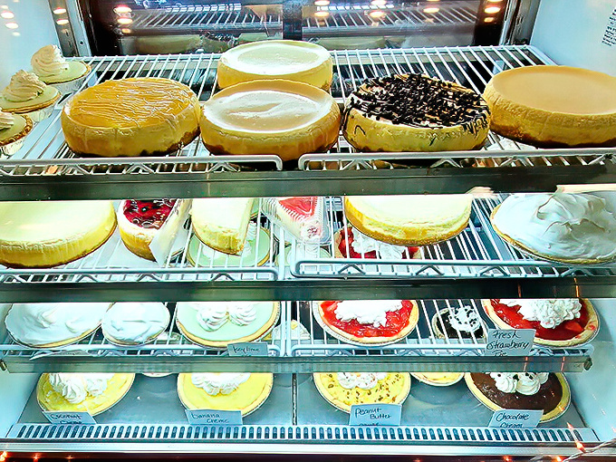 A dessert case that would make your grandmother both proud and jealous—cheesecakes and cream pies waiting for their forever homes.