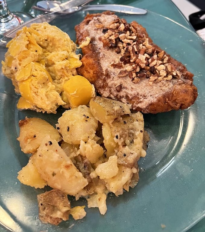 Southern comfort reimagined—crispy chicken alongside buttery potatoes that would make your grandmother both jealous and proud.