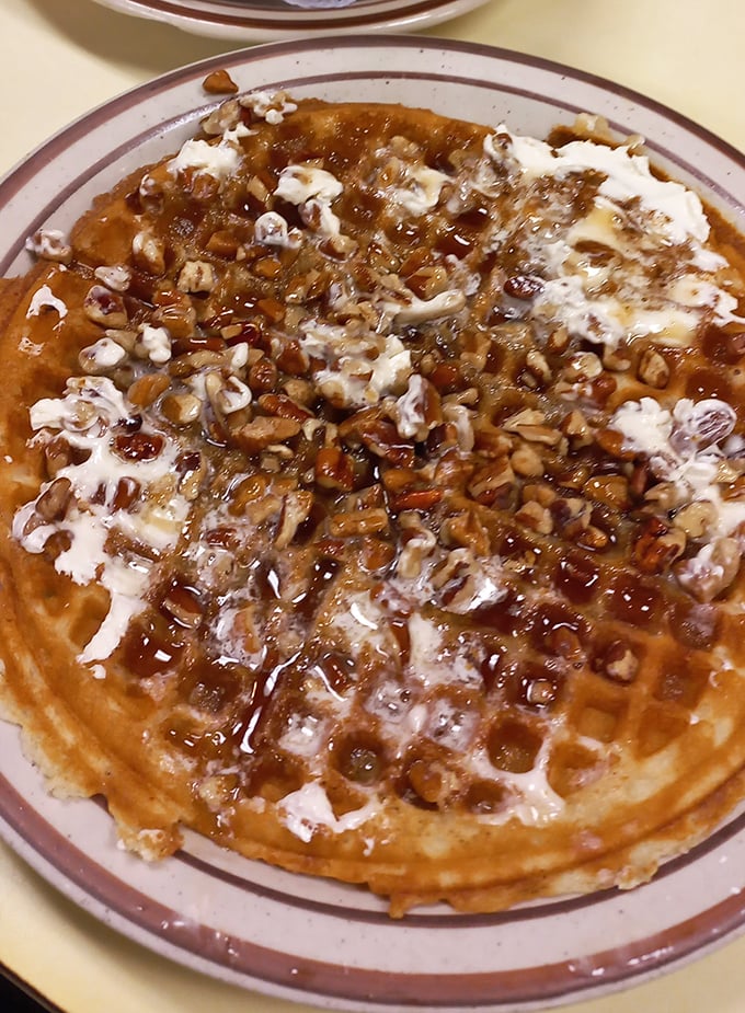 The pecan waffle at Ole's isn't just breakfast, it's architecture—a perfect foundation of crispy waffle supporting a skyline of nuts and syrup.