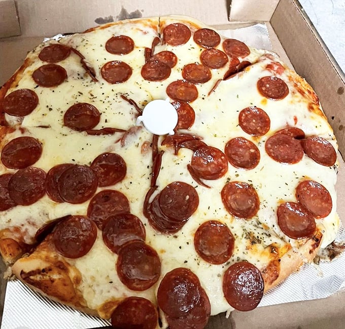 Pepperoni cups creating those crispy little grease pools that your doctor hates but your soul loves.