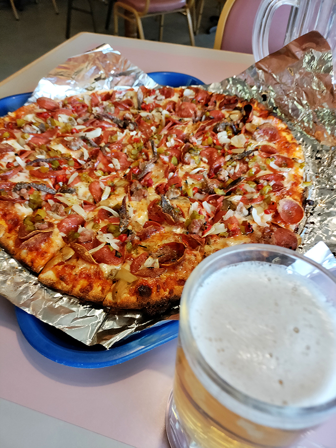 This isn't just pizza—it's a meaty masterpiece where pepperoni and sausage join forces in a flavor alliance that would make the Avengers jealous.