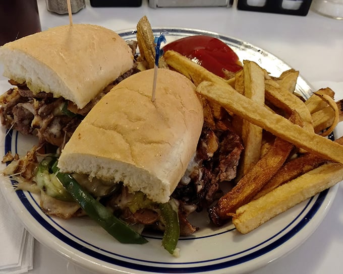 The Philly sandwich doesn't mess around – tender meat, perfectly grilled peppers, and a roll that somehow contains this beautiful chaos without surrendering to sogginess.