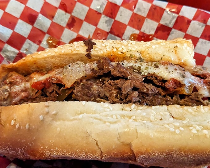 The cross-section tells the whole story. Tender beef, melted cheese, and that perfect roll—a holy trinity of Pennsylvania sandwich perfection.
