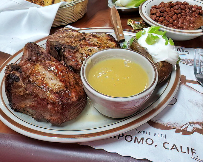 Pork chops that make you question every other pork chop you've ever eaten. That golden pool of butter sauce? It's not optional—it's essential life enhancement.