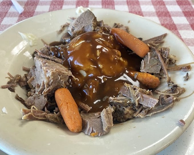 Pot roast that's had a long, meaningful relationship with gravy. Those carrots aren't garnish – they're witnesses to meat perfection.
