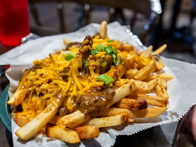Poutine that would make Canadians renounce their citizenship. Crispy fries swimming in gravy with cheese—the holy trinity of comfort.