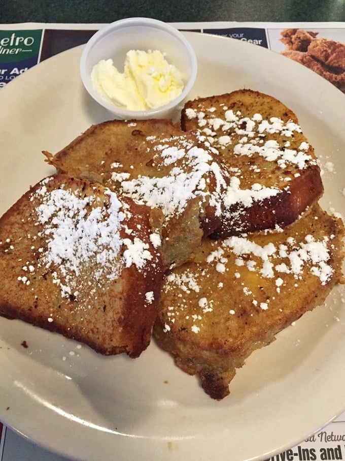 French toast that looks like it's been dipped in sunshine and dusted with powdered sugar snow. Breakfast or dessert? Yes, please.
