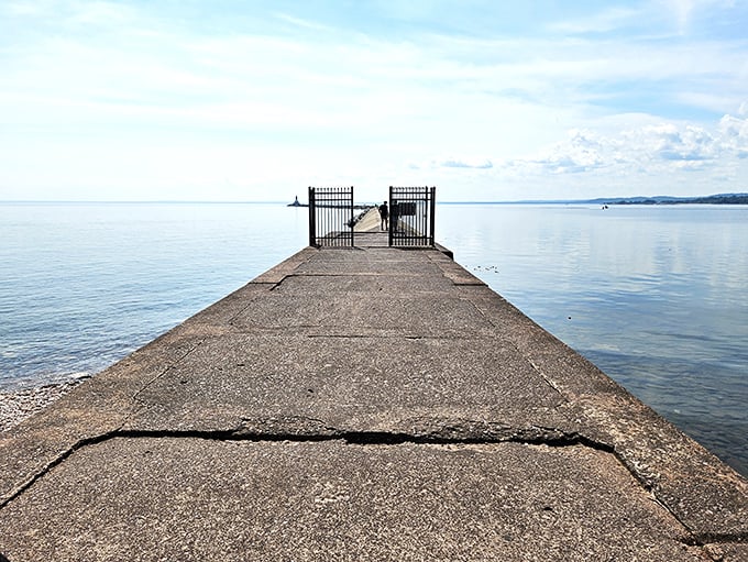 This unassuming pier at Presque Isle Park extends like an invitation into Lake Superior's vastness—nature's version of the red carpet.