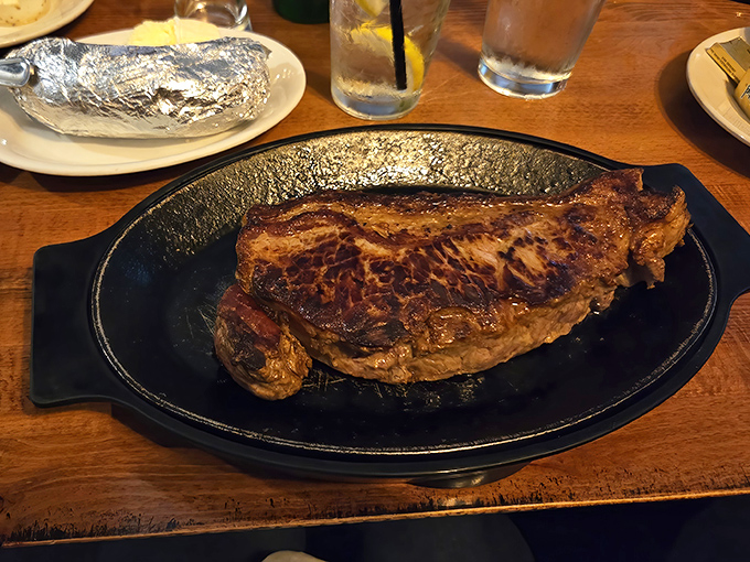 Prime rib so commanding it needs its own zip code. That sear isn't just color—it's a flavor force field locking in juices that took hours to develop.