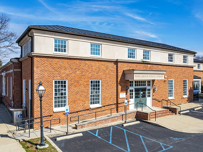 The New Castle Public Library—where modern knowledge meets colonial charm, proving that good ideas never go out of style.