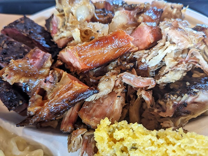 This pulled pork and cornbread doesn't just fall apart – it surrenders with dignity after a long, honorable battle with smoke and time.