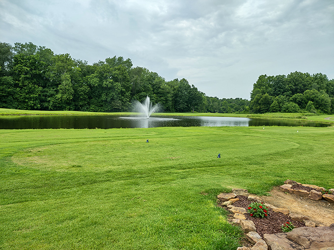Quail Crossing Golf Club presents a slice of serenity with its emerald fairways and tranquil water features—even non-golfers can appreciate this peaceful landscape.