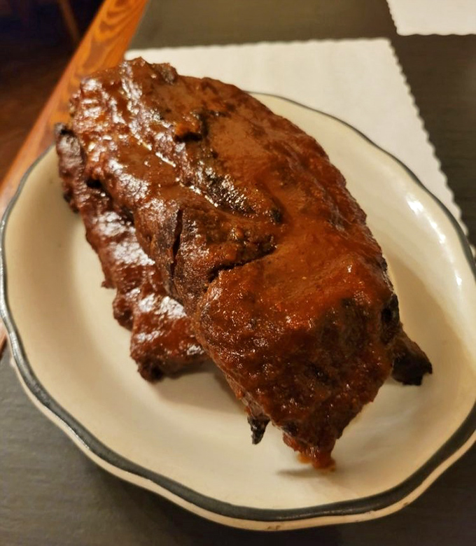 These ribs didn't just fall off the bone—they practically jumped! Glistening with sauce and promising the kind of messy satisfaction worth every napkin.