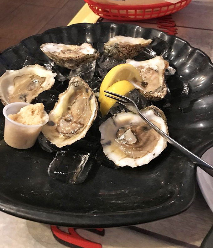 Raw oysters at Crabby Bill's—nature's perfect appetizer served with nothing more than a squeeze of lemon and a dash of anticipation.