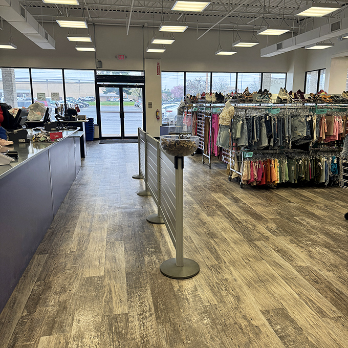 The clean, welcoming checkout area—where fashion dreams come true and credit cards breathe sighs of relief simultaneously.
