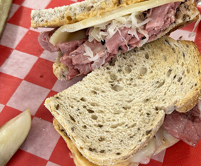 A proper Reuben doesn't need fancy marketing—just perfect balance. This sandwich has more layers than your favorite drama series. 