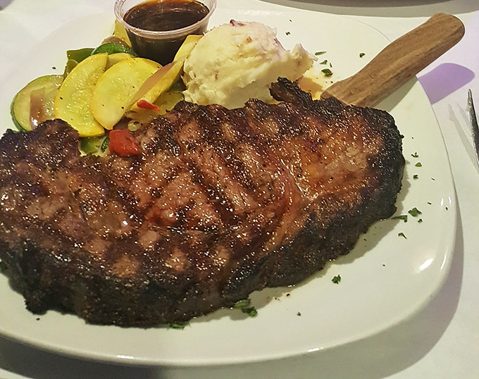 This isn't just a ribeye—it's a masterclass in meat. The kind of steak that makes vegetarians question their life choices.