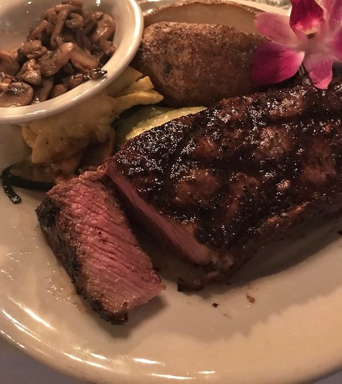 This isn't just a steak – it's a masterpiece of primal simplicity. Perfectly seared ribeye that would make even the most dedicated vegetarian question their life choices.