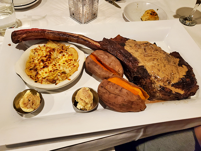 This tomahawk steak doesn't just make an entrance—it stages a full Broadway production. The mac and cheese co-star deserves its own Tony Award.