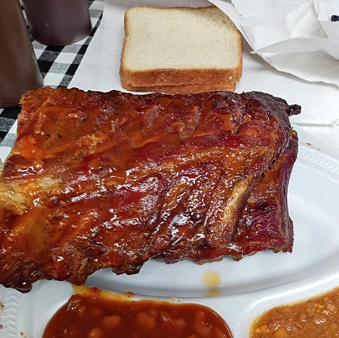 Ribs that make you forget your table manners. That glorious lacquered exterior gives way to meat that's holding onto the bone just enough to maintain its dignity.