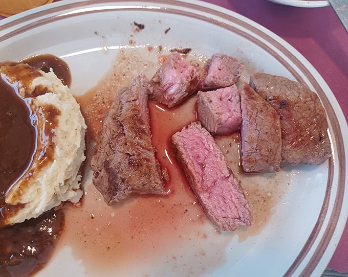 Tender roast beef swimming in its own juices alongside creamy mashed potatoes. This isn't just dinner—it's edible therapy after a long day.