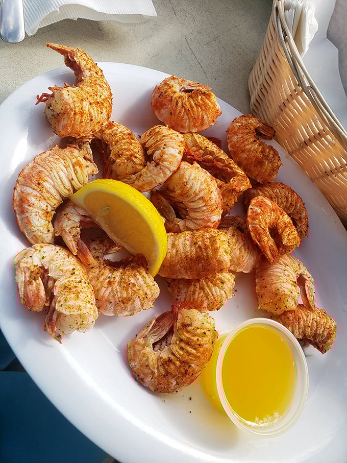 These rock shrimp look like they're doing the backstroke in seasoning – crispy, succulent, and begging for a squeeze of that lemon.