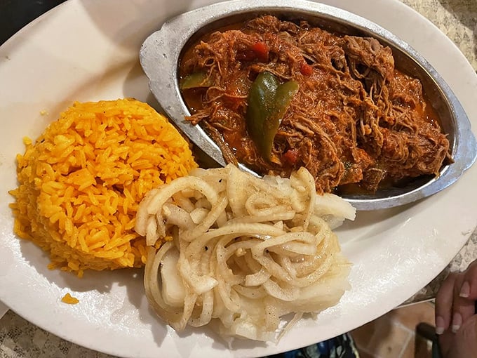 Ropa Vieja—where shredded beef mingles with peppers and onions in a sauce so good you'll want to bathe in it.