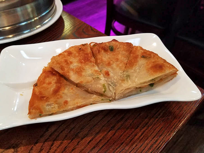 Crispy, flaky, and layered like the best stories—these scallion pancakes make you wonder why you'd ever settle for ordinary bread again.