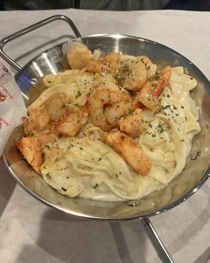 Pasta swimming with plump shrimp in a creamy sea. Carbs and seafood—a romance that never goes out of style.