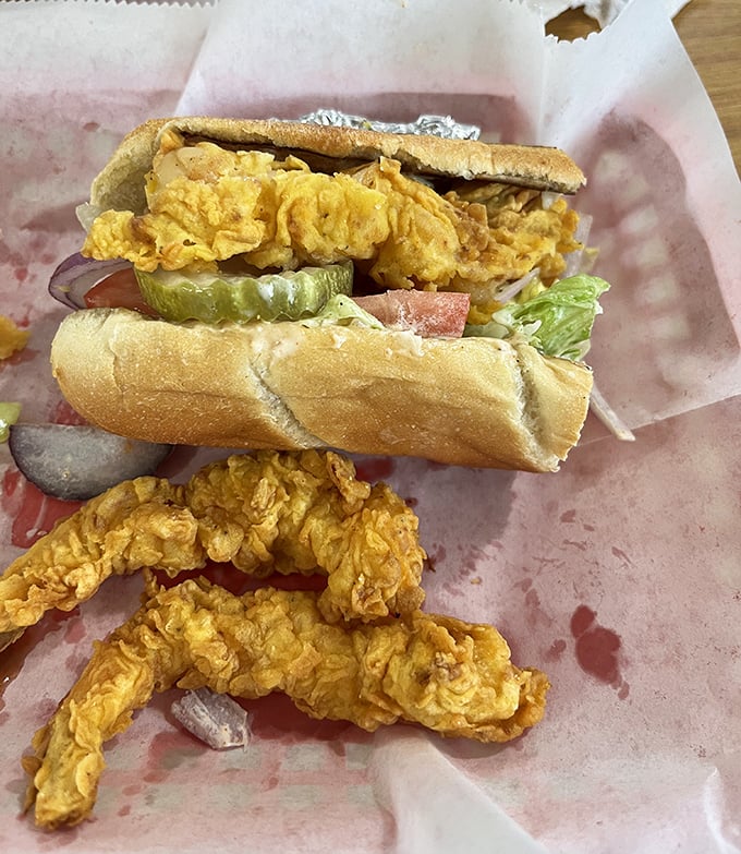 The perfect po' boy doesn't exi—wait, it does! Crispy golden shrimp nestled in fresh bread with all the fixings.