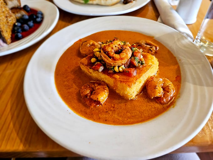 Shrimp and grits done right—creamy comfort meets coastal flair in a bowl that'll make you reconsider everything.