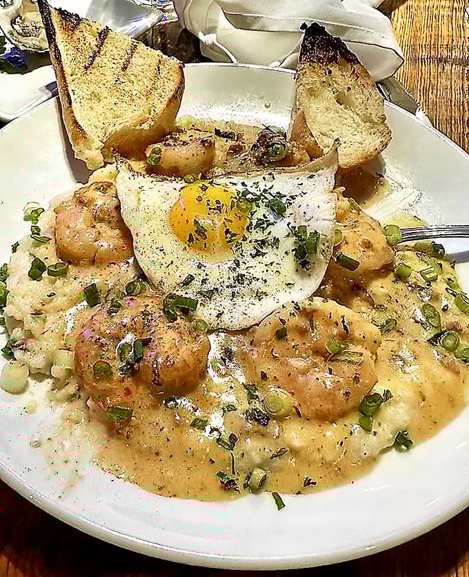 Shrimp and grits with a sunny-side egg on top – because breakfast and dinner decided to have a delicious love child.