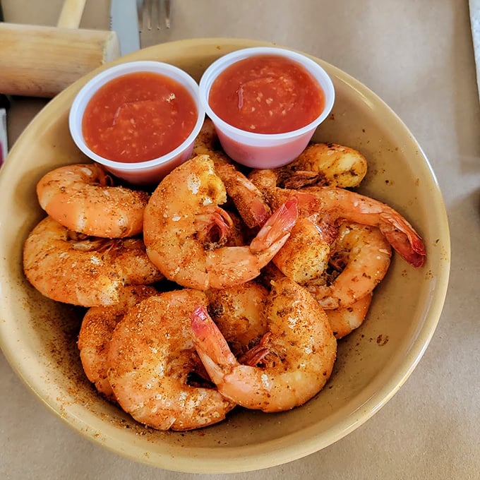 Spice-dusted jumbo shrimp that snap with freshness—proof that sometimes the simplest preparations yield the most profound flavors.