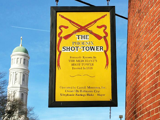This vintage sign reveals the tower's original name—the Merchant's Shot Tower—a reminder that even landmarks sometimes get rebranding.