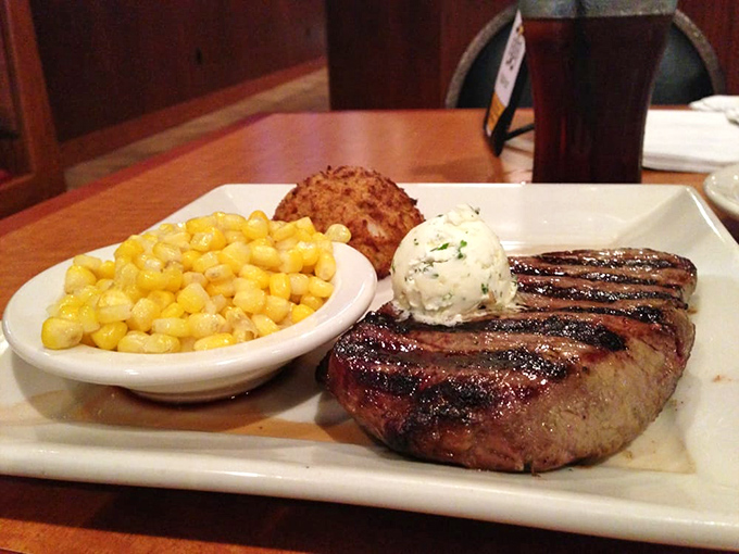 A perfectly grilled sirloin that would make Ron Swanson weep tears of joy, complete with herb butter that melts into meaty perfection.