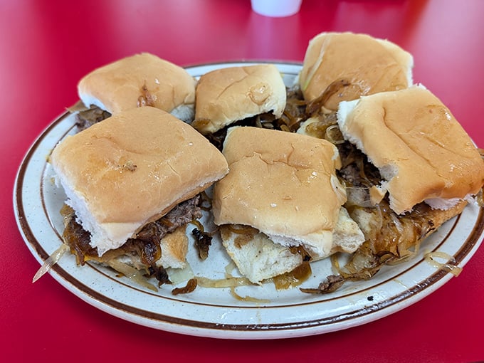 Six sliders on a plate isn't gluttony – it's strategy. Each two-bite wonder disappears so quickly you'll need reinforcements to satisfy your craving.