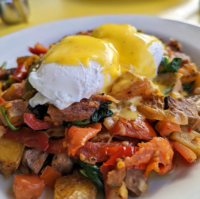 Breakfast redemption comes in the form of this brisket hash – a mountain of morning glory topped with perfectly poached eggs.