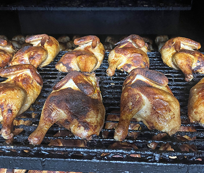 These chickens didn't just meet smoke, they had a transformative relationship with it. That golden skin is basically meat jewelry.