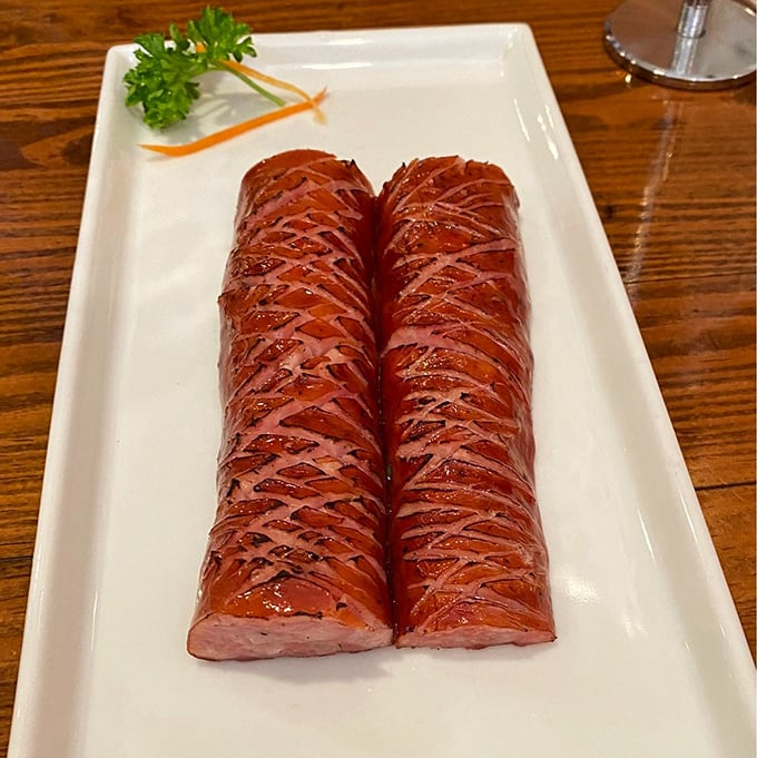 Kielbasa so perfectly scored and glistening, it belongs in the Louvre. This isn't just sausage—it's edible Polish heritage on a plate.