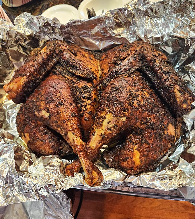 This smoked chicken looks like it's auditioning for a food magazine cover. Crispy, seasoned skin protecting juicy meat beneath – nature's perfect design.
