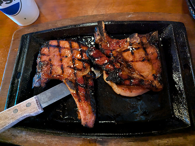 These pork chops have the kind of perfect grill marks that would make Bobby Flay weep with joy. Smoky, succulent perfection on a sizzling plate.