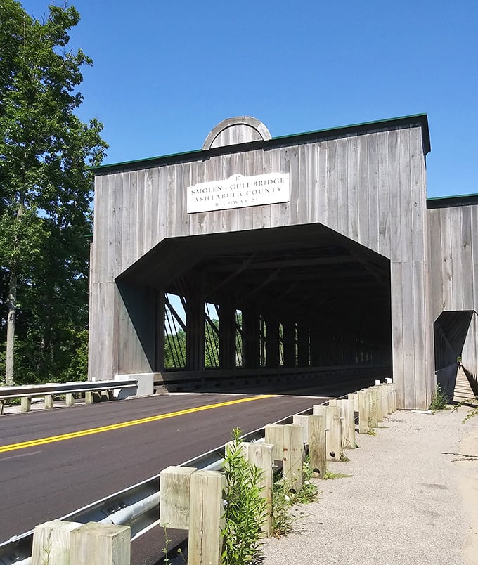 The Smolen-Gulf Bridge isn't just America's longest covered bridge—it's a wooden cathedral that transforms a simple drive into a journey through time.