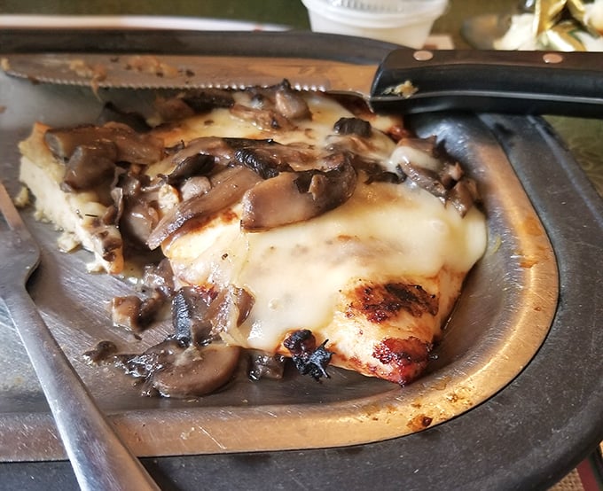 When mushrooms and melted cheese join forces, resistance is futile. This smothered chicken dish is what food dreams are made of.
