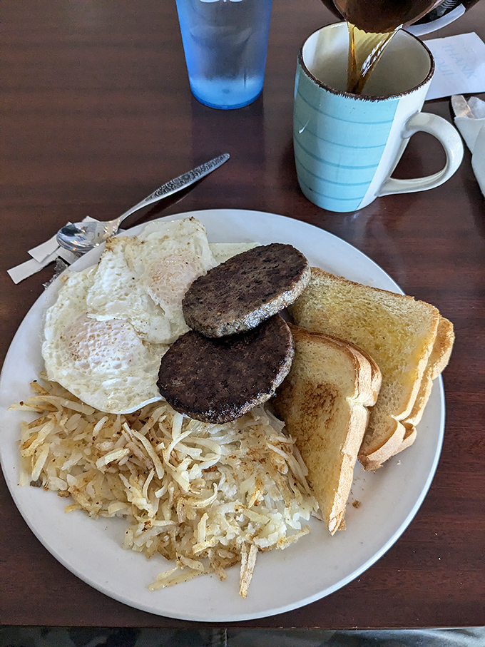 The breakfast classics done right: eggs cooked to perfection, hash browns with that ideal crisp-to-tender ratio, and sausage patties that mean business.