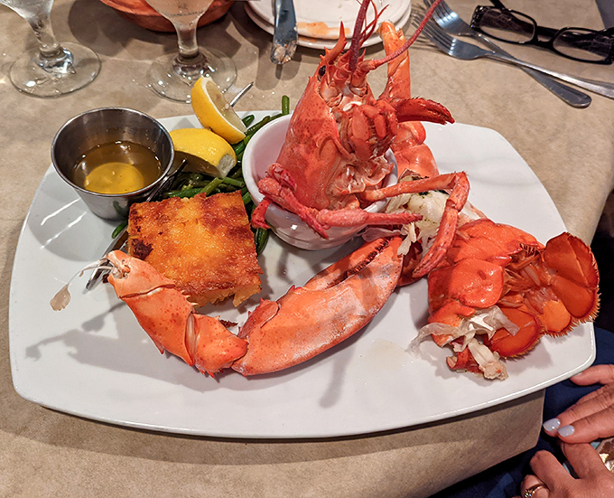 Meet your dinner date—a gloriously red Maine lobster that didn't travel all this way to disappoint your taste buds.