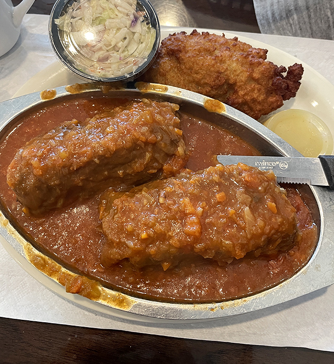 Stuffed cabbage that would make your grandmother weep with joy. These savory parcels swimming in tomato sauce are comfort food incarnate.