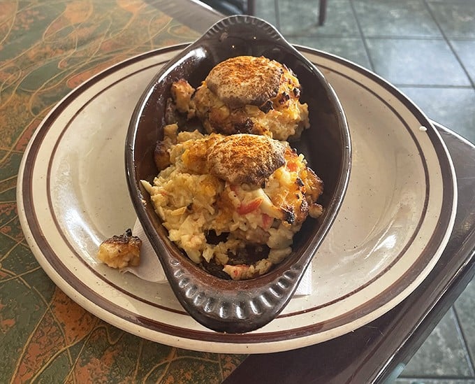 These stuffed mushrooms aren't just appetizers—they're little flavor bombs packed with what appears to be a savory mixture that would make any mushroom proud.