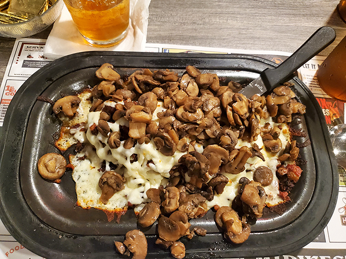 Behold the legendary stuffed tenderloin, smothered in mushrooms and melted cheese. Diet plans enter at their own risk.