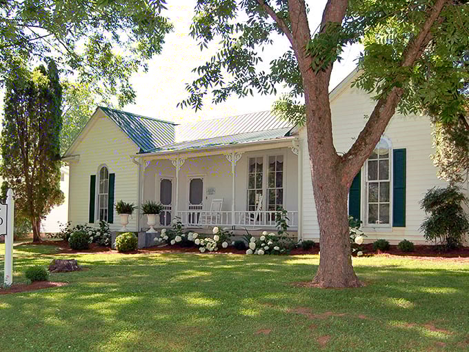 White rocking chairs on a pristine porch surrounded by hydrangeas – Southern hospitality doesn't get more picture-perfect than the Sutton Homestead.